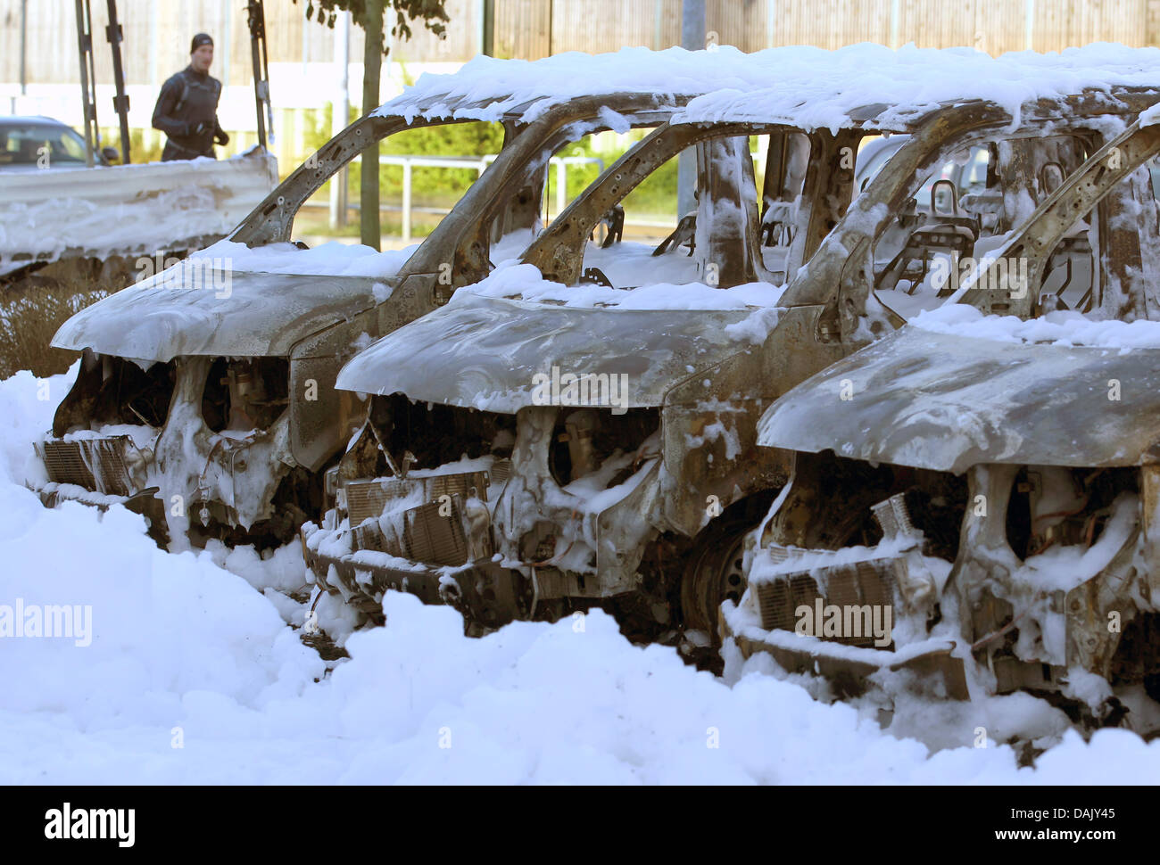 Burbt ot transporters of German armed forces stand on a DEKRA-car park ...