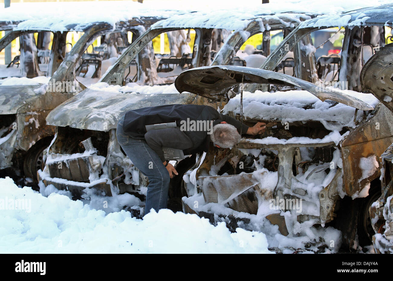 Burbt ot transporters of German armed forces stand on a DEKRA-car park ...