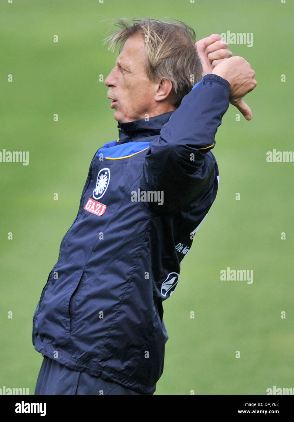 Eintracht's coach Christoph Daum instructs the team during a public ...