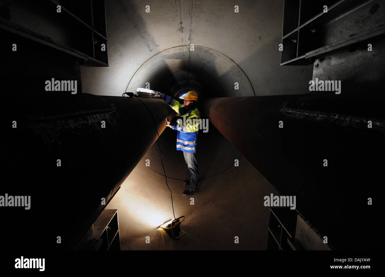 Vattenfall worker Dirk Grimm inspects two new teleheating tunnels in ...