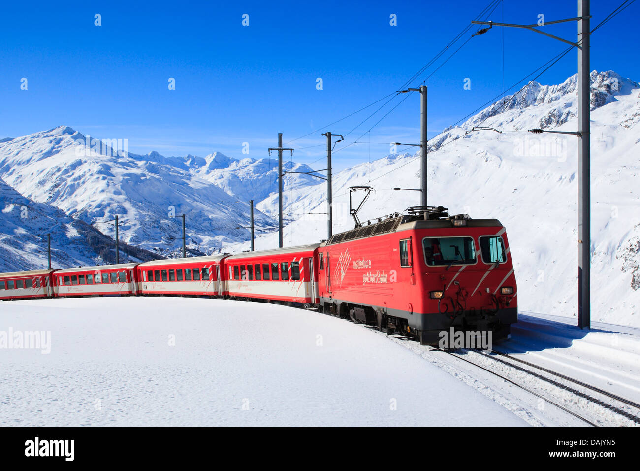 the Matterhorn Gotthard Bahn in snow-covered mountain panorama ...
