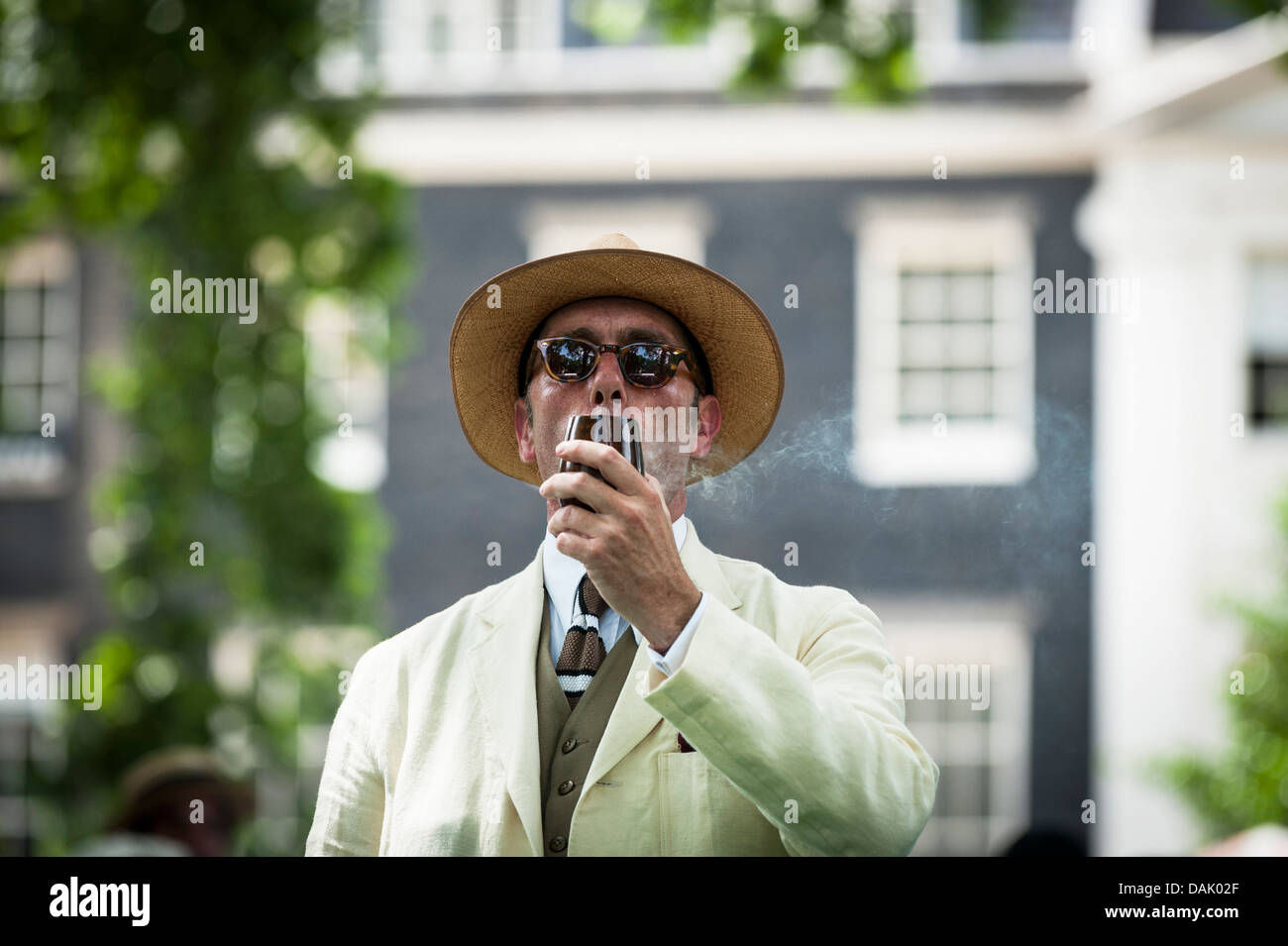 Gustav Temple, editor of the Chap magazine smoking the official pipe at ...