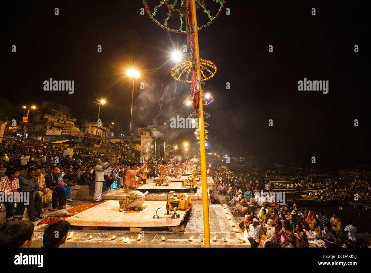 Pilgrims performing aarti at a ghat, Ganges River, Varanasi, Uttar ...