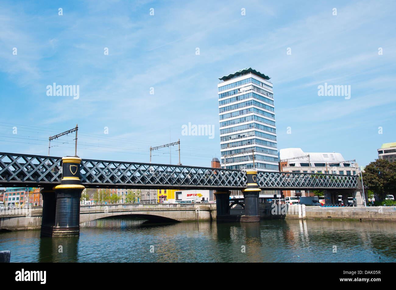 DART suburban railway line bridge crossing river Liffey central Dublin ...