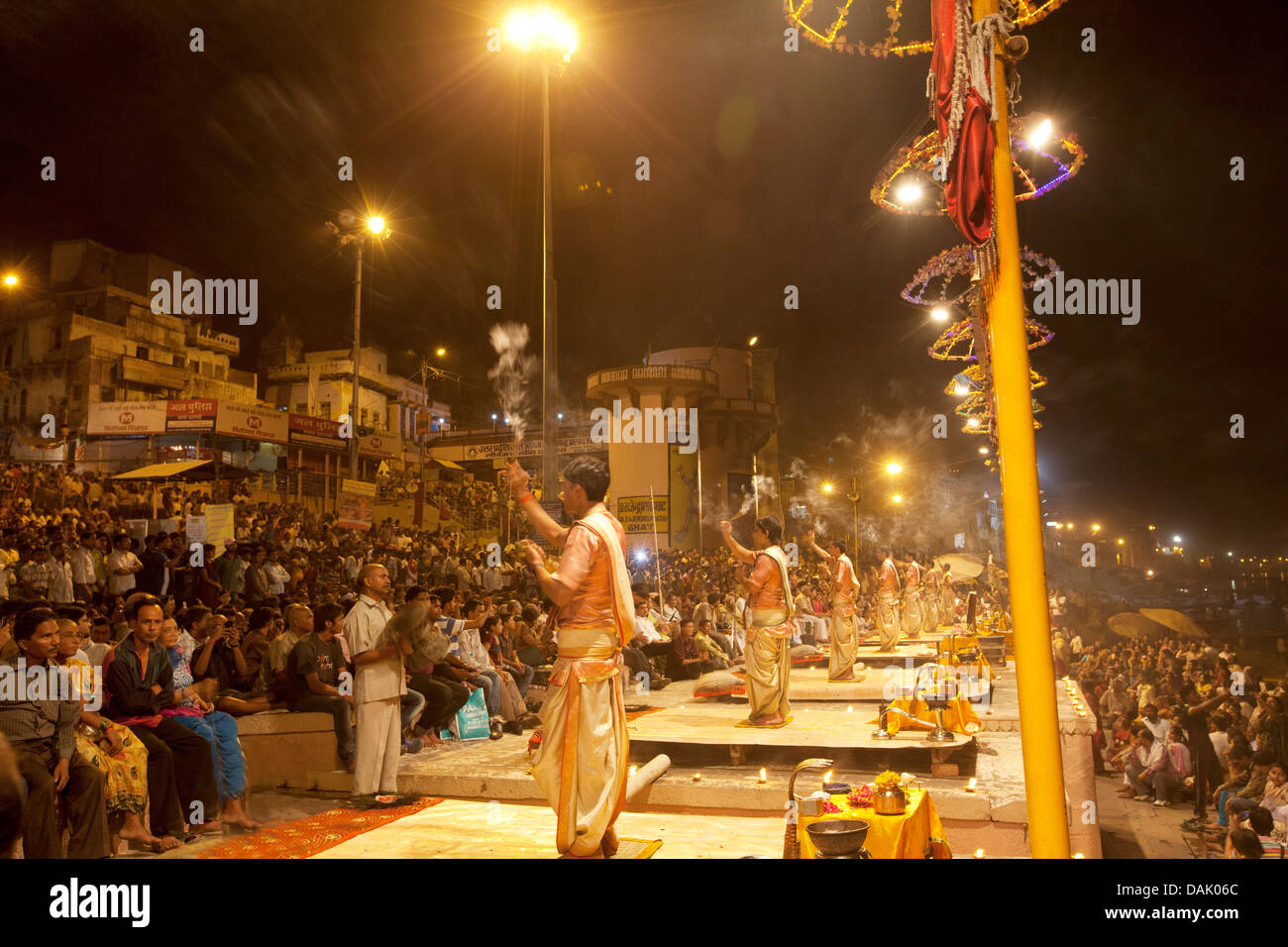 Pilgrims performing aarti at a ghat, Ganges River, Varanasi, Uttar ...