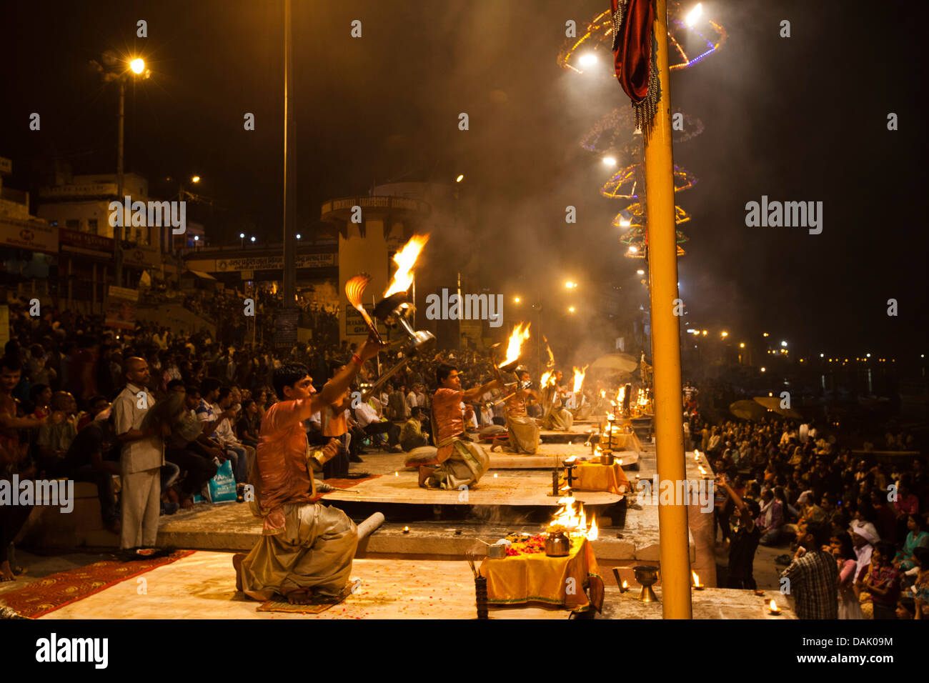Pilgrims performing aarti at a ghat, Ganges River, Varanasi, Uttar ...