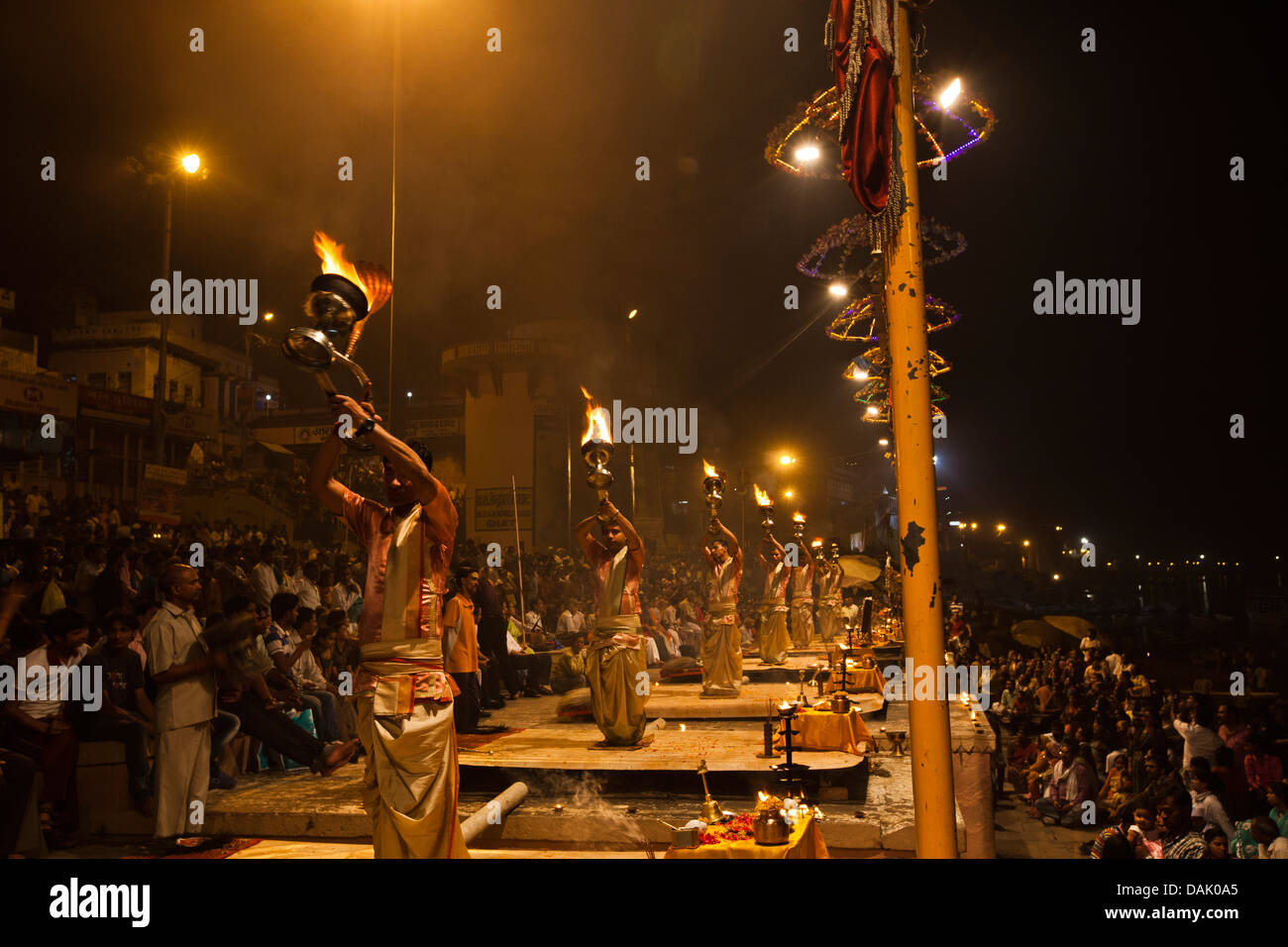 Pilgrims performing aarti at a ghat, Ganges River, Varanasi, Uttar ...