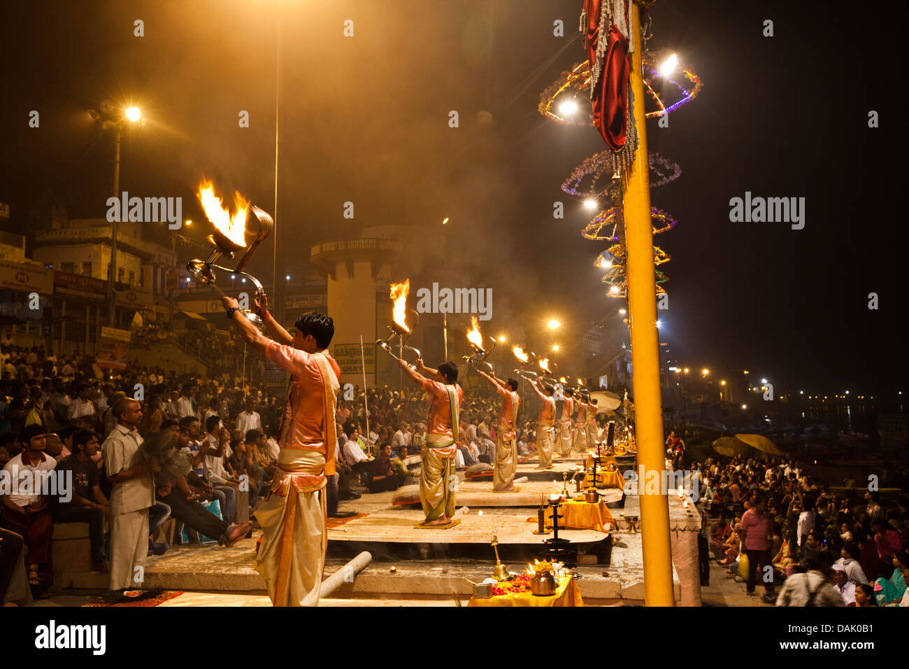 Pilgrims performing aarti at a ghat, Ganges River, Varanasi, Uttar ...