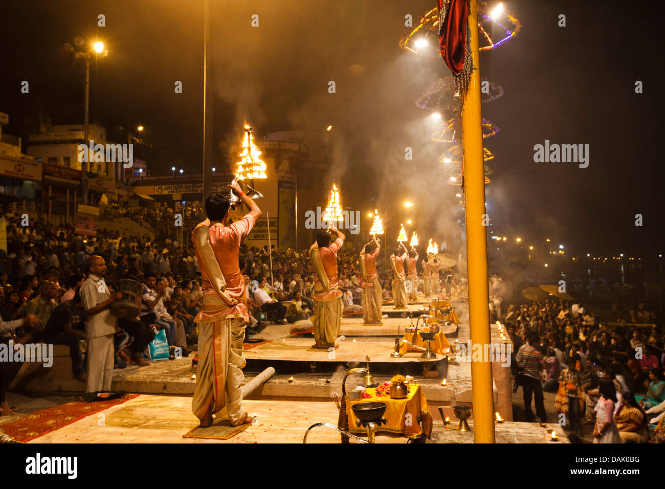 Pilgrims performing aarti at a ghat, Ganges River, Varanasi, Uttar ...