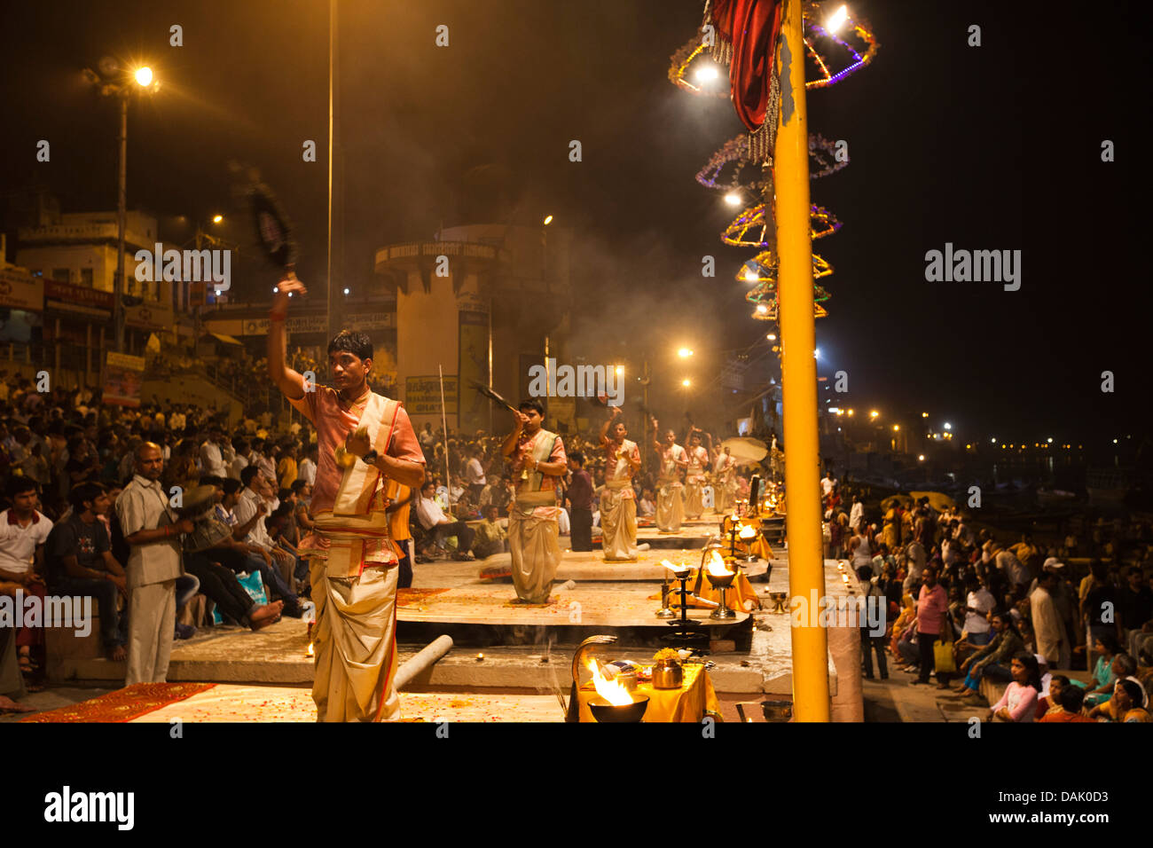 Pilgrims performing aarti at a ghat, Ganges River, Varanasi, Uttar ...