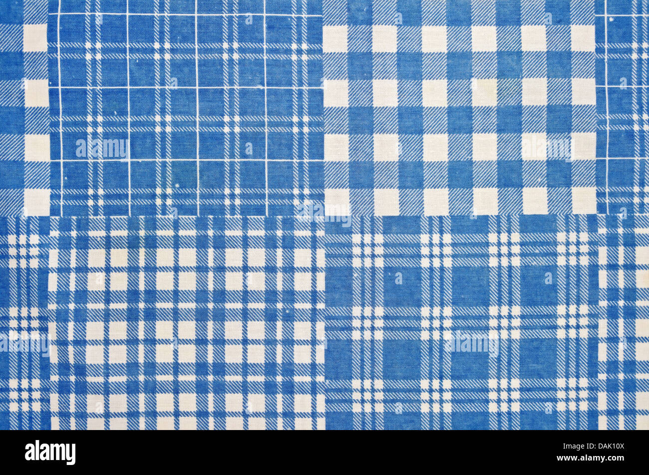 Texture of the cotton fabric with a blue checkered pattern Stock Photo ...