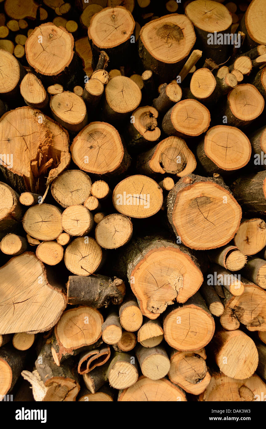 stacked logs background Stock Photo - Alamy