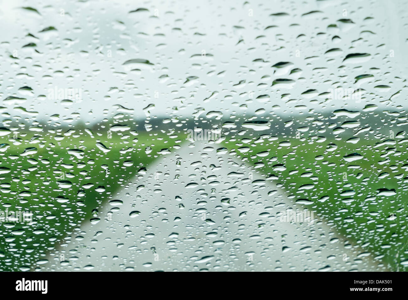 Raindrops on windowpane Stock Photo - Alamy