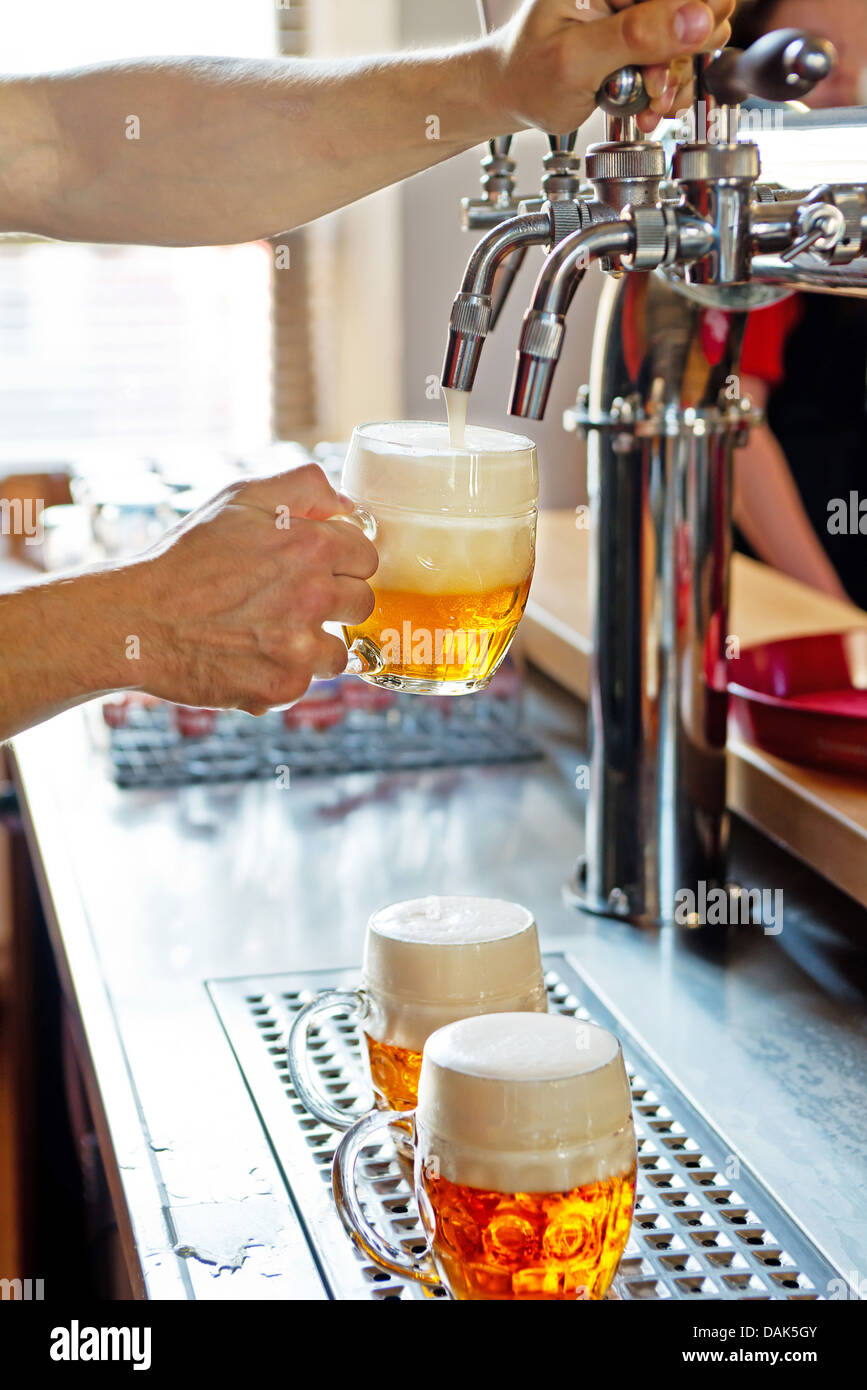 beer on tap Stock Photo - Alamy