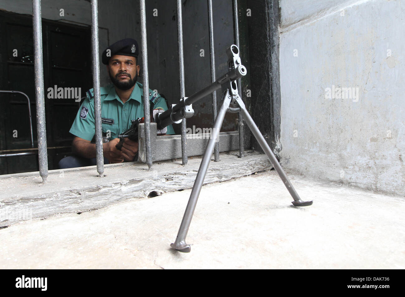 Dhaka, Bangladesh. 15th July, 2013. Members of Bangladeshi police stand ...