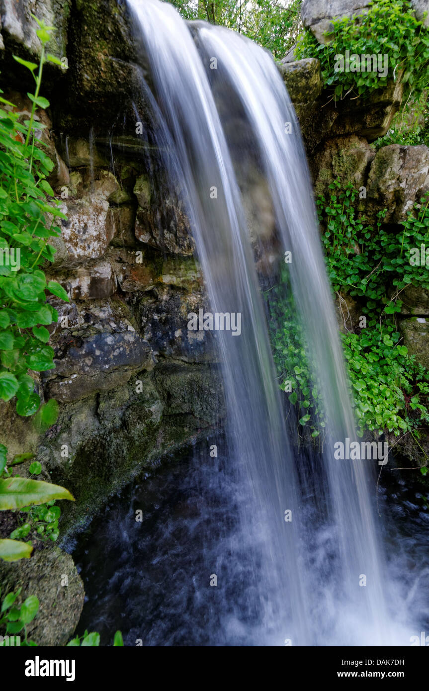Small Waterfall photographed with a slow shutter speed creating a ...