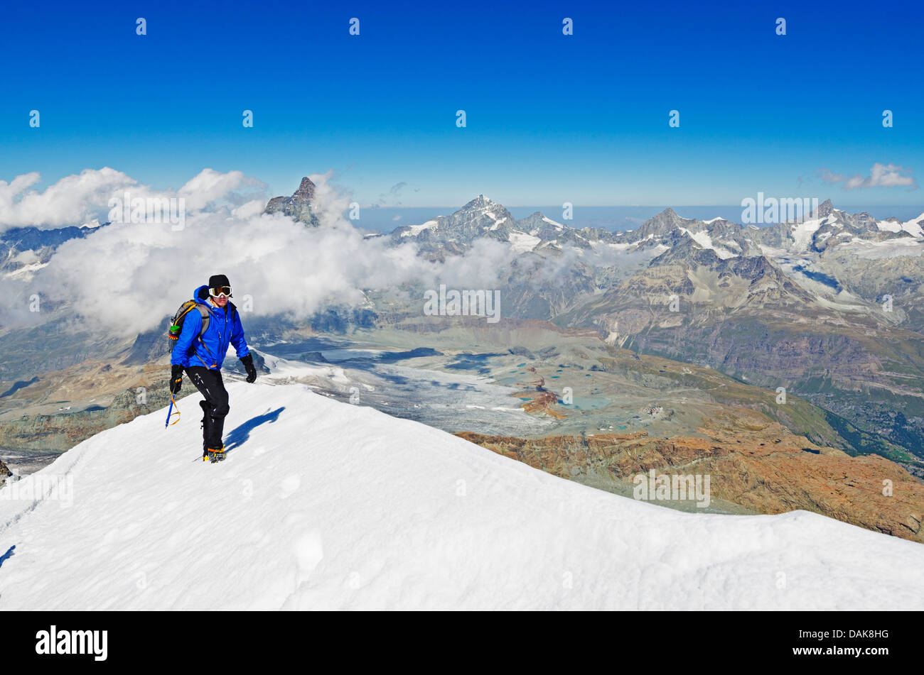 climber on Breithorn mountain (4164m), Matterhorn in background ...
