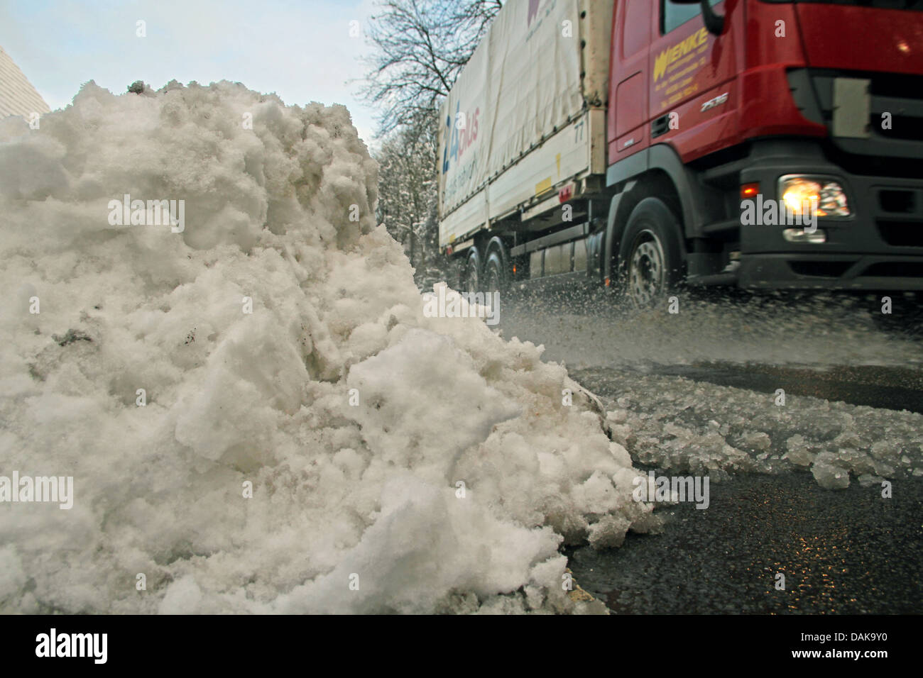truck driving in slush, Germany Stock Photo - Alamy