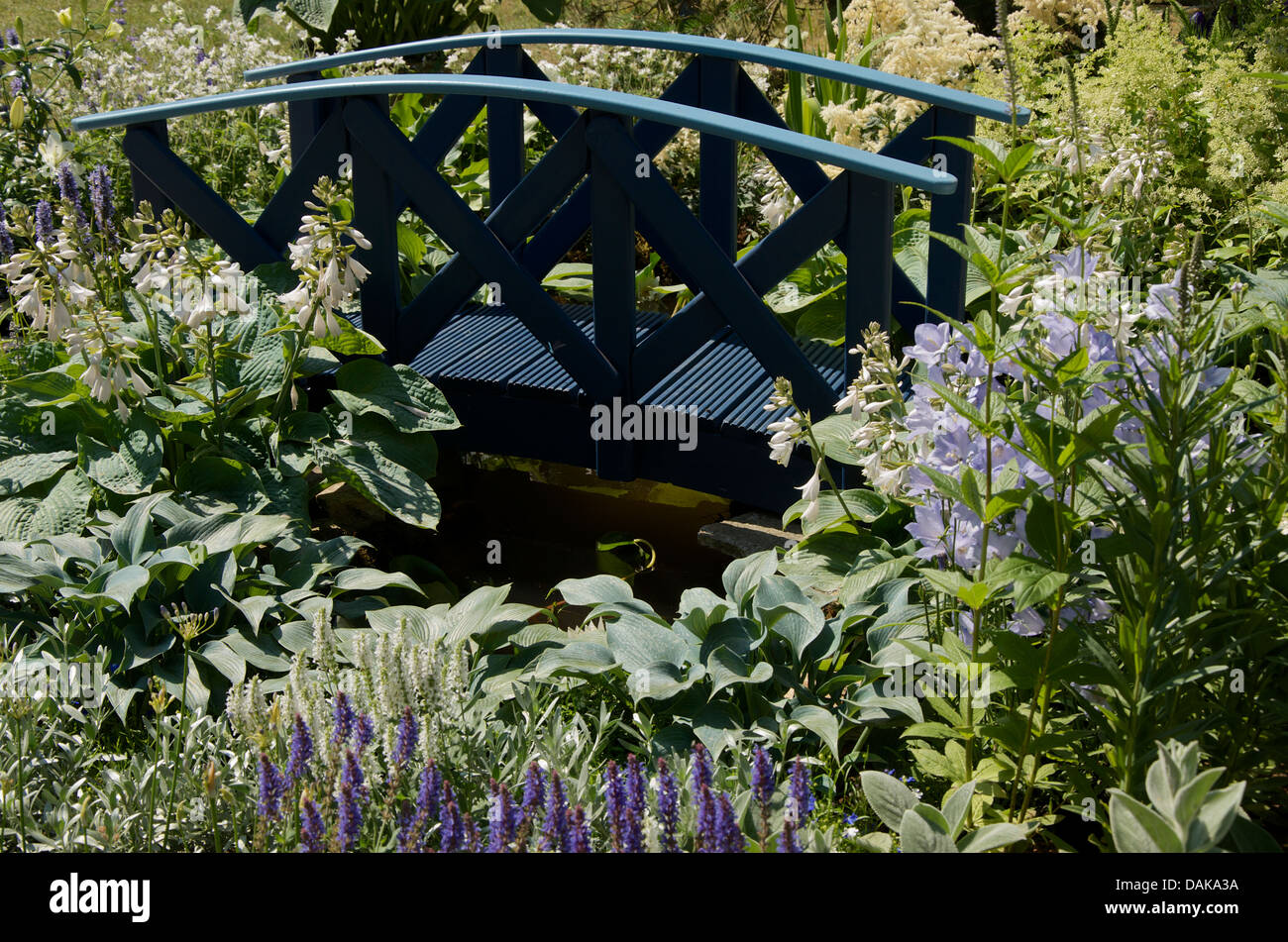 The bridge in the Willow Pattern Summer Garden at RHS Hampton Court ...