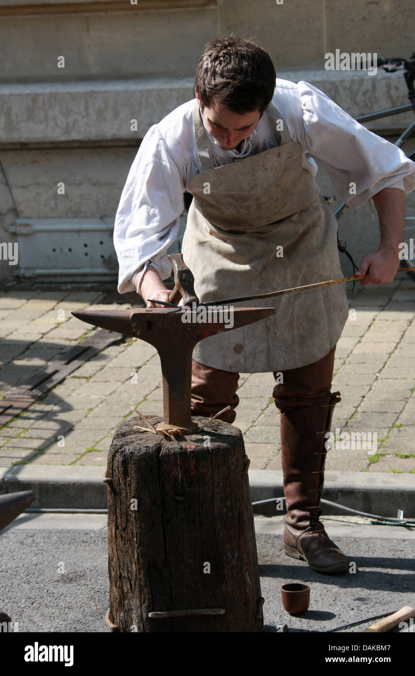 Blacksmith Demonstrating Medieval Method of Iron Working, Joan of Arc ...