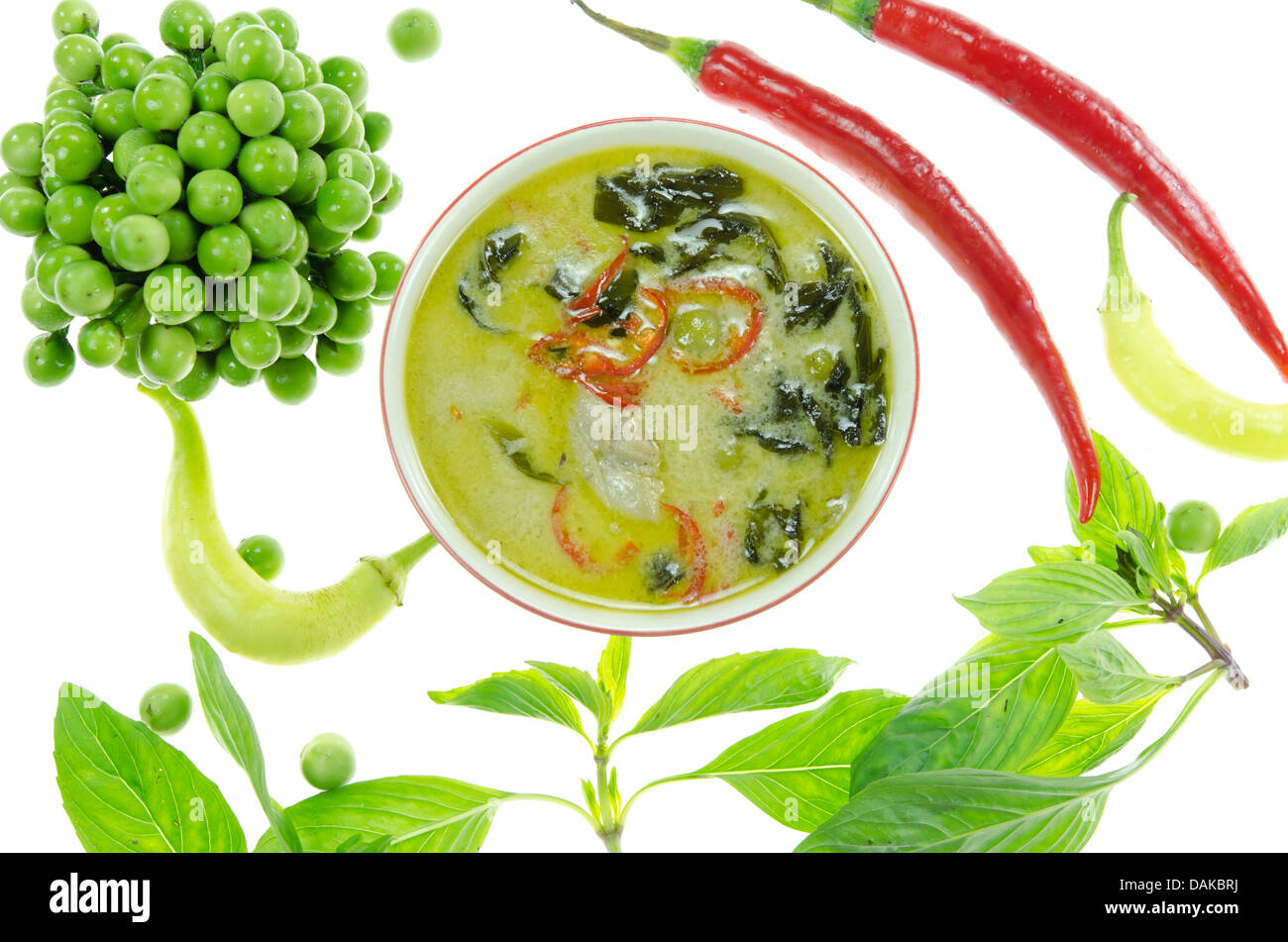 top view green chicken curry with fresh vegetable over white , asian ...