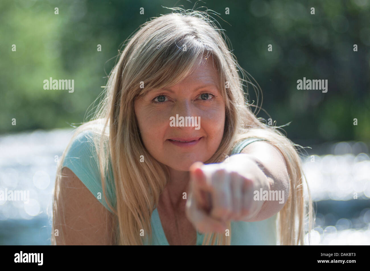 Woman pointing at camera hi-res stock photography and images - Alamy