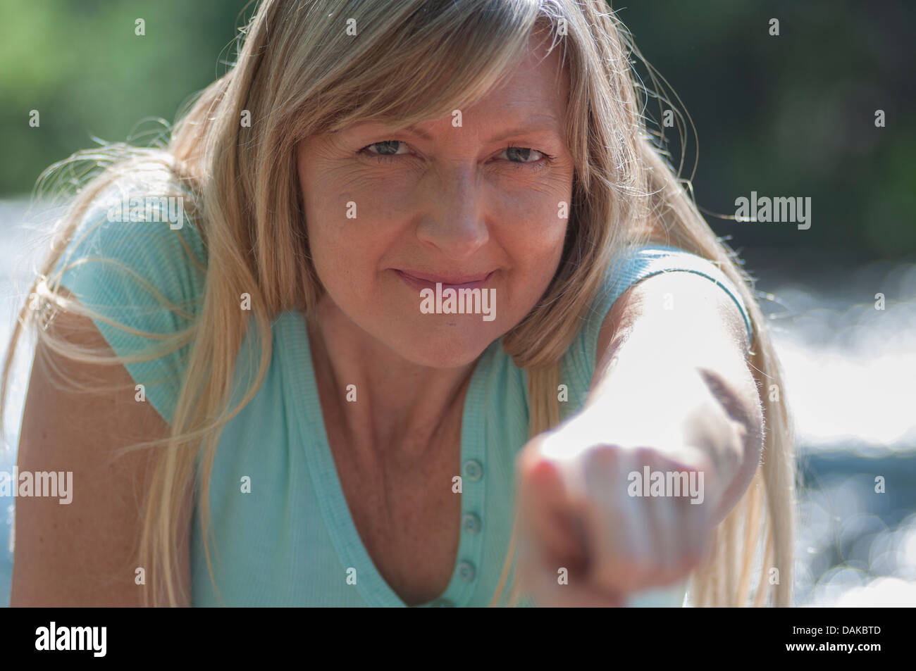 Woman pointing at camera hi-res stock photography and images - Alamy