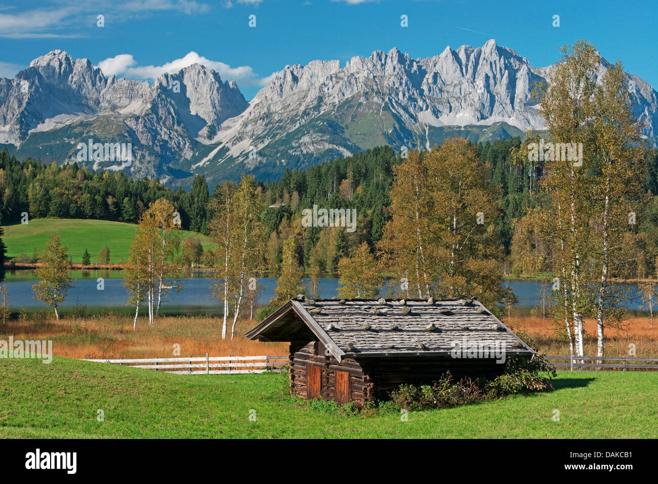 barn with stones on the roof at the Schwarzsee, Wild Kaiser, Austria ...