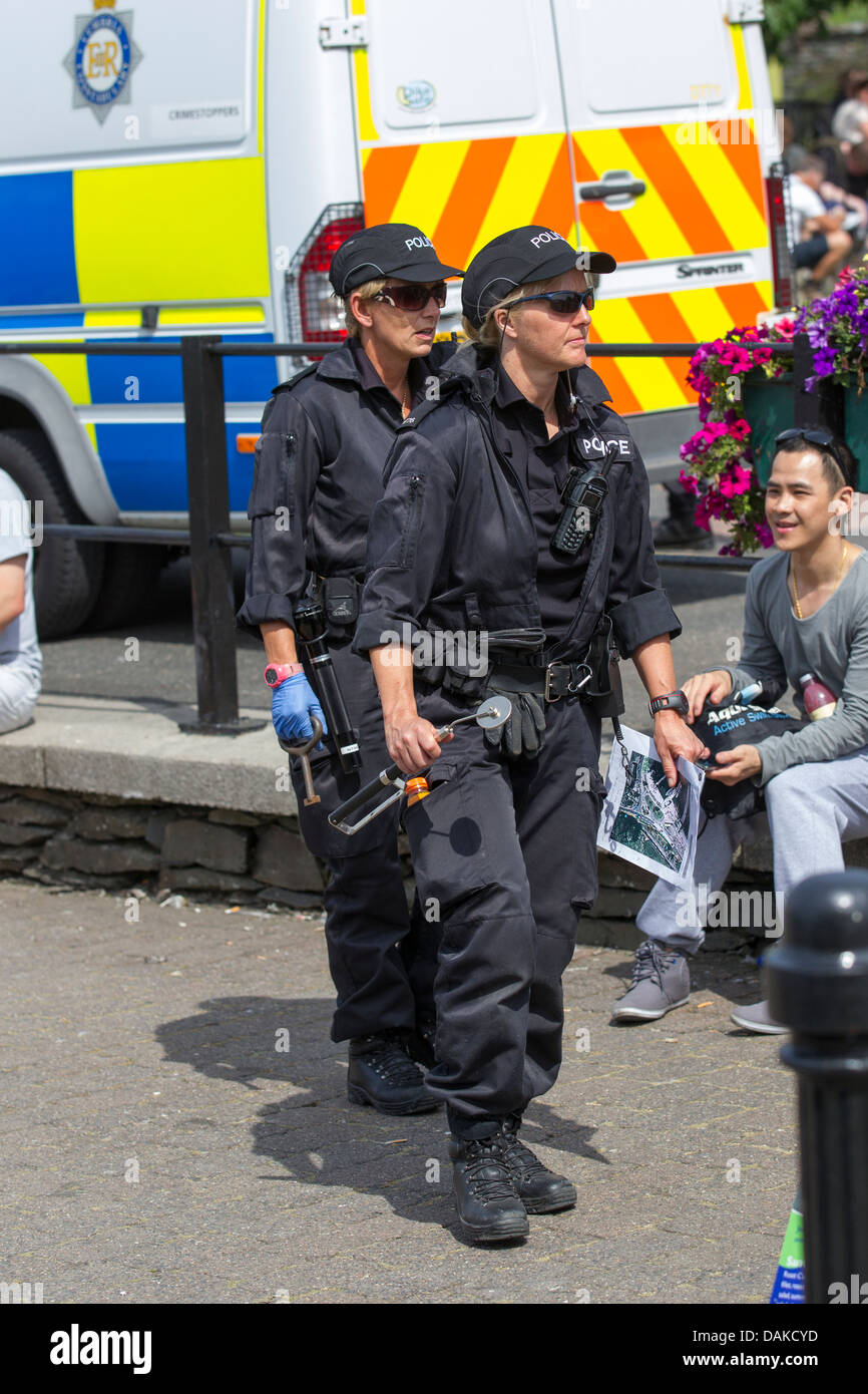 Police security female officers checking for bombs - explosives before ...