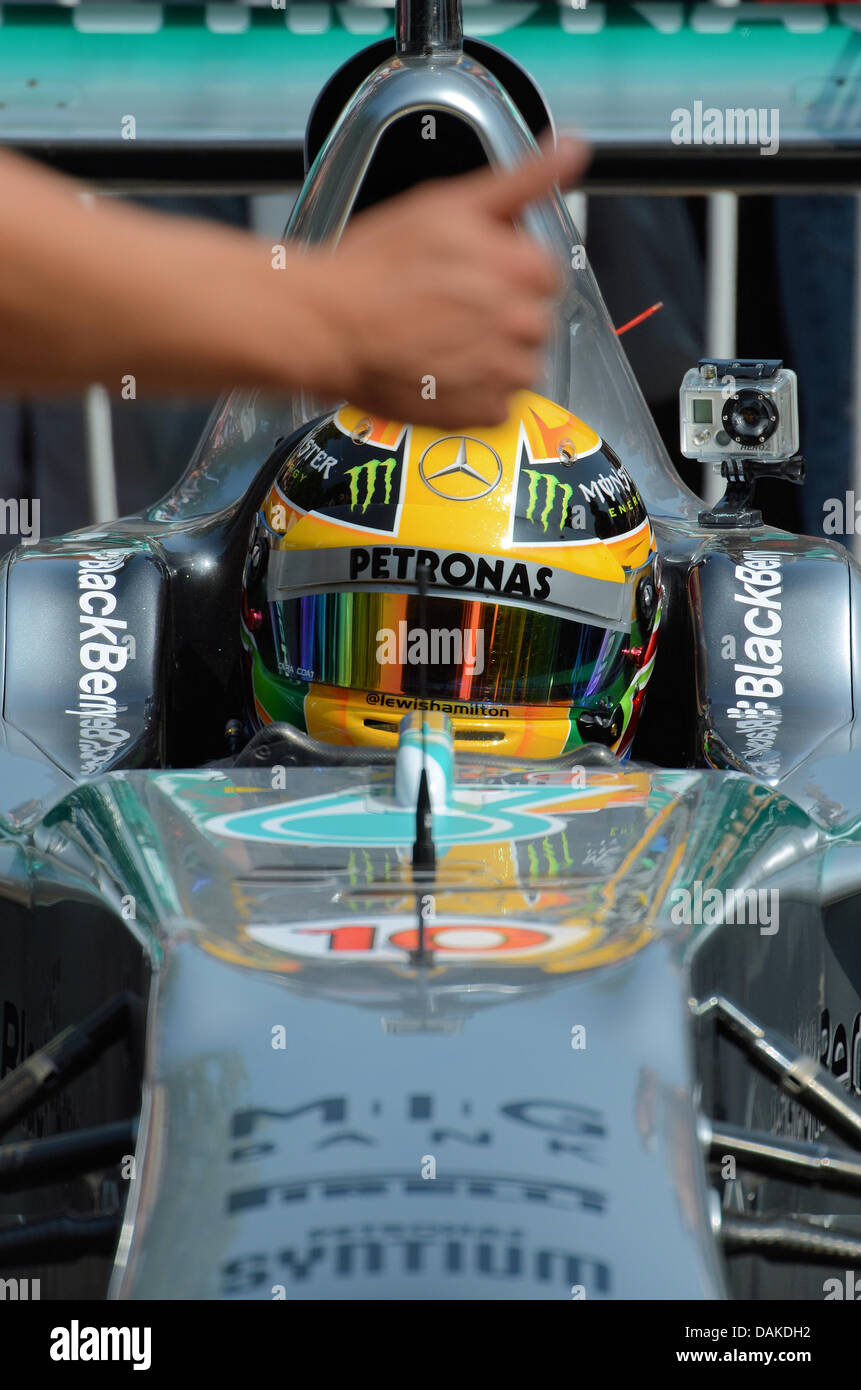 Lewis Hamilton in a Mercedes Formula 1 racing car. The Goodwood ...