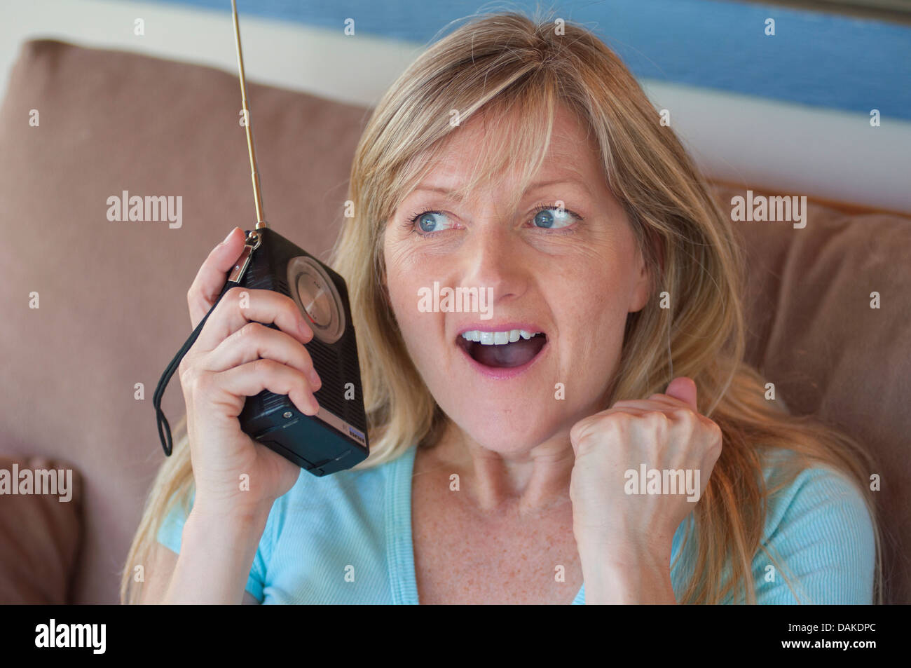 Listening to radio hi-res stock photography and images - Alamy