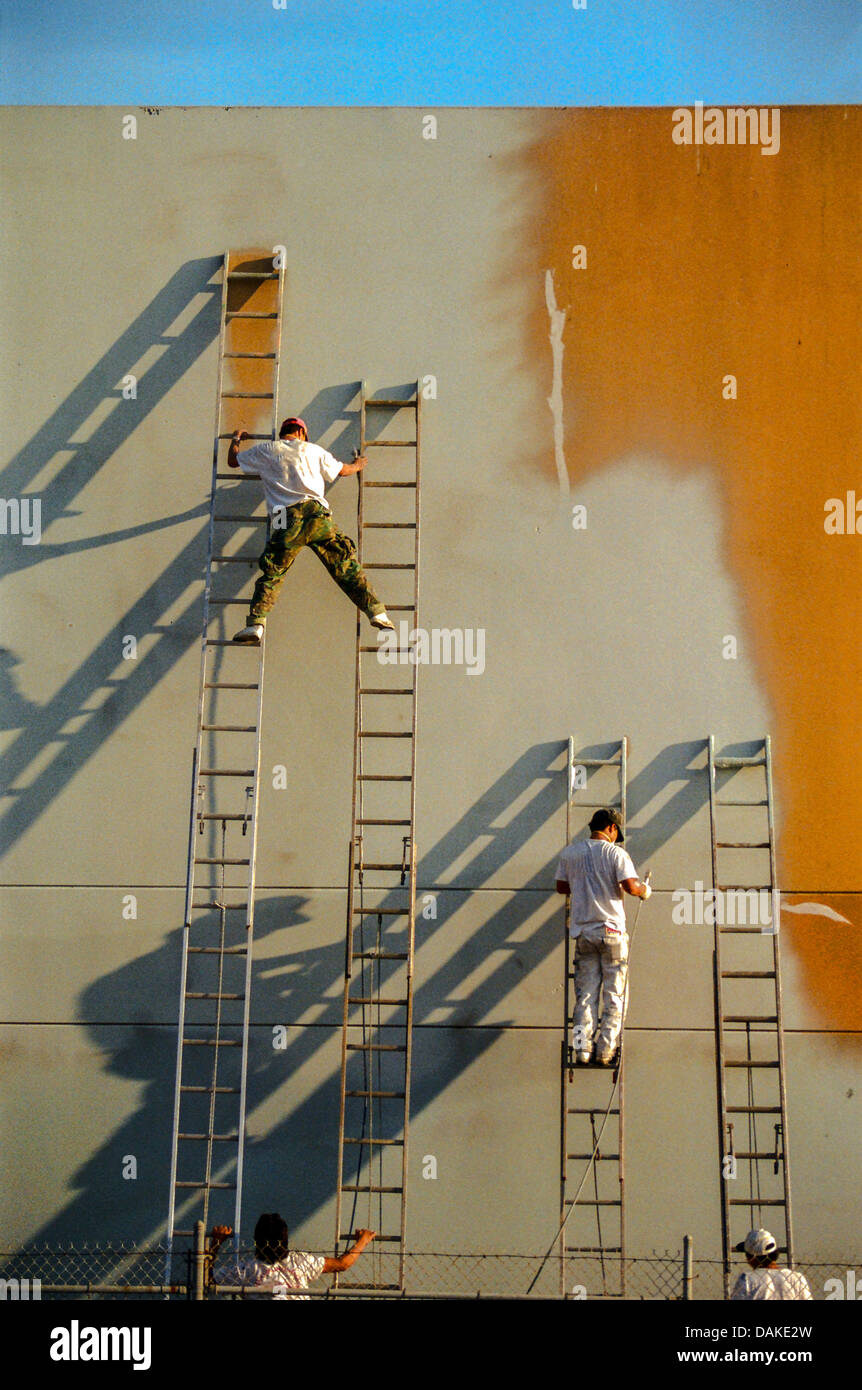 Working from ladders hi-res stock photography and images - Alamy