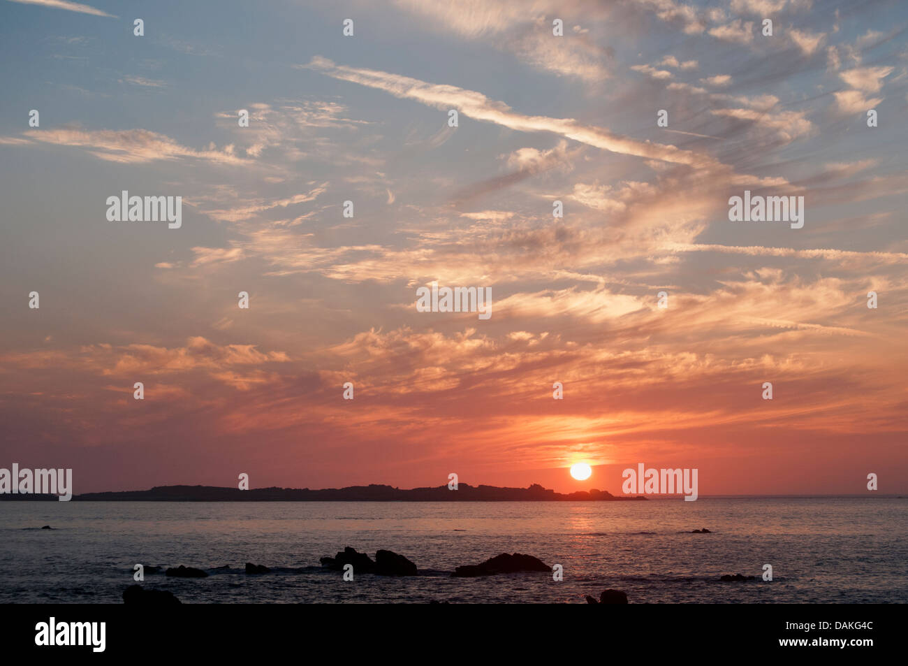 Sunset over Burhou island, off the Channel Island of Alderney Stock ...