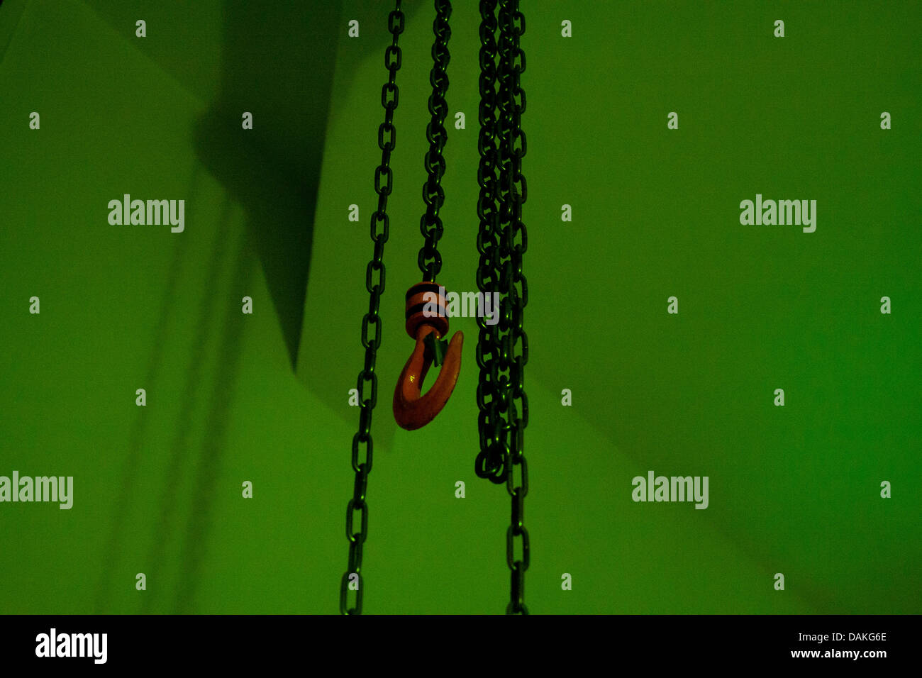 hook hanging from chain Stock Photo - Alamy