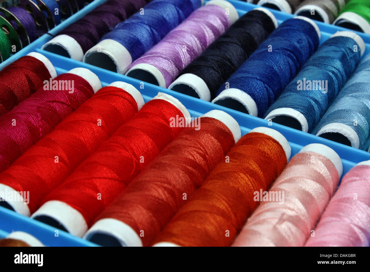 Colored sewing thread Stock Photo - Alamy