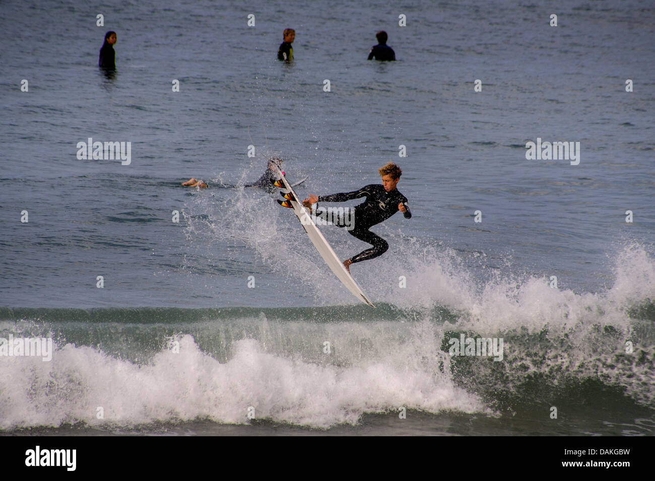 Teen boy and girl members of the San Clemente, CA, High School surfing ...