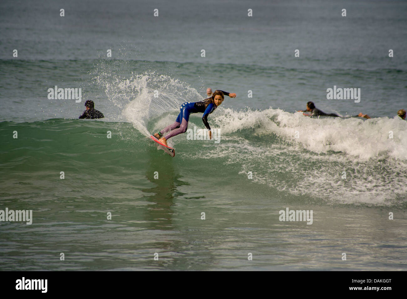 Teen boy and girl members of the San Clemente, CA, High School surfing ...