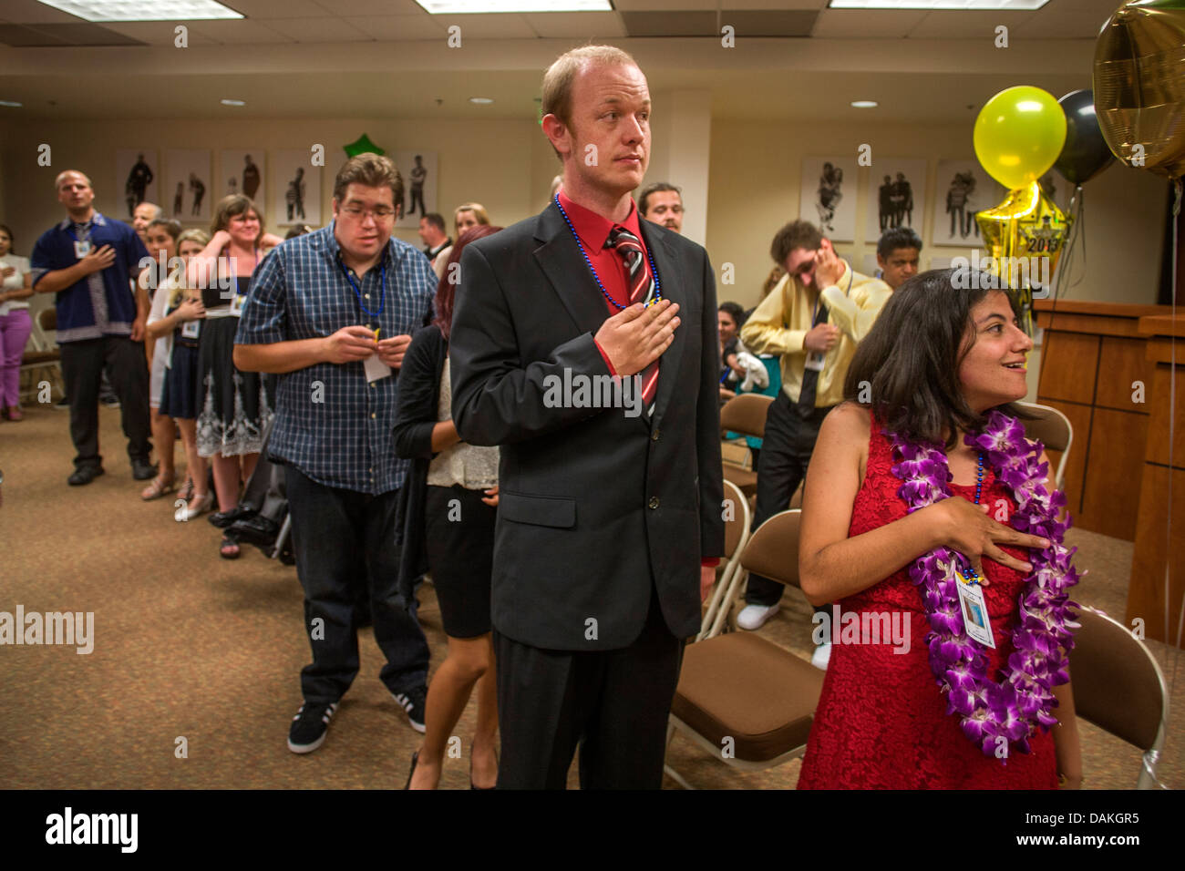 Adult Transition Program (ATP) students recite the Pledge of Allegiance ...