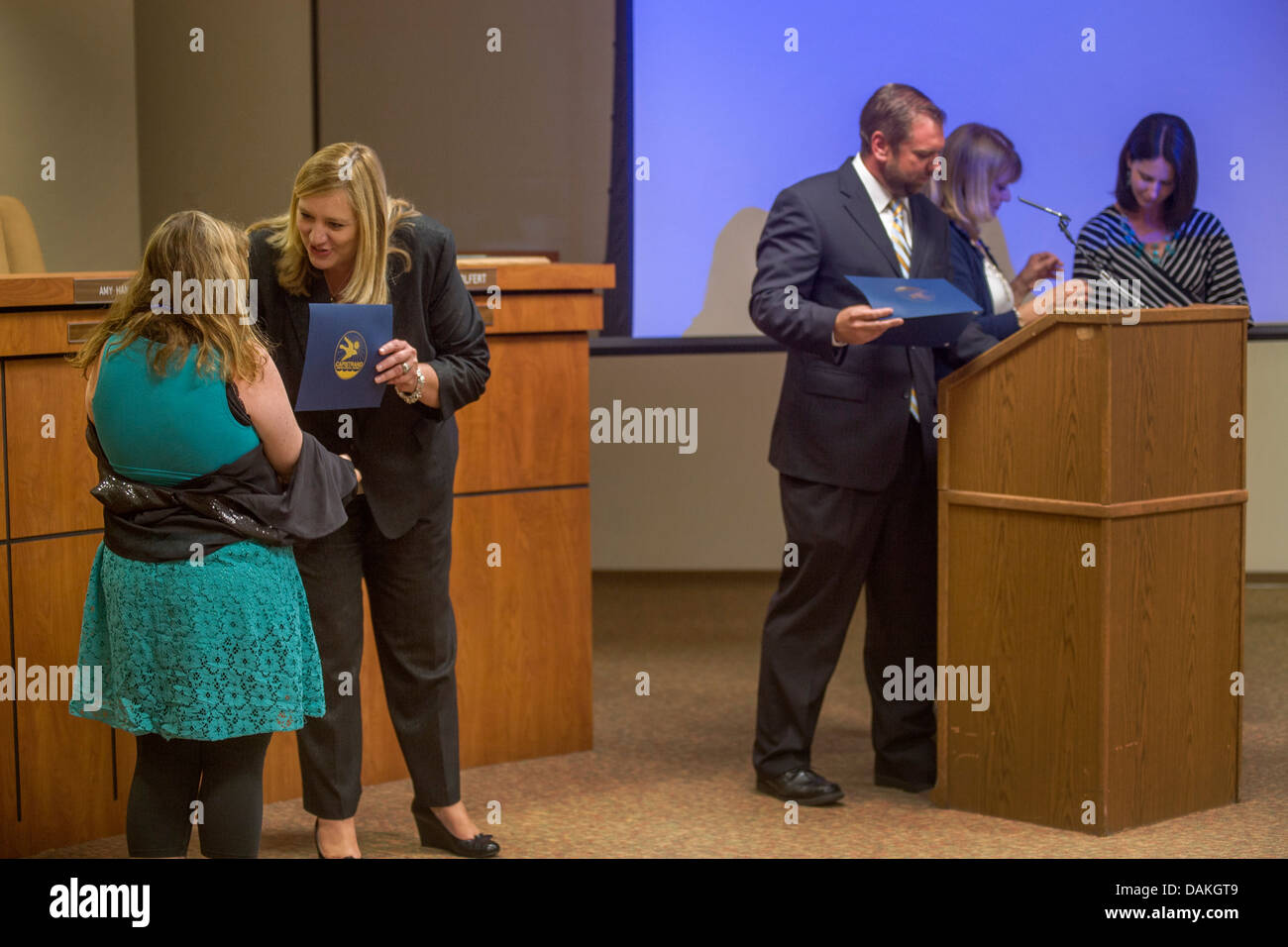 An Adult Transition Program (ATP) student receives her diploma at ...