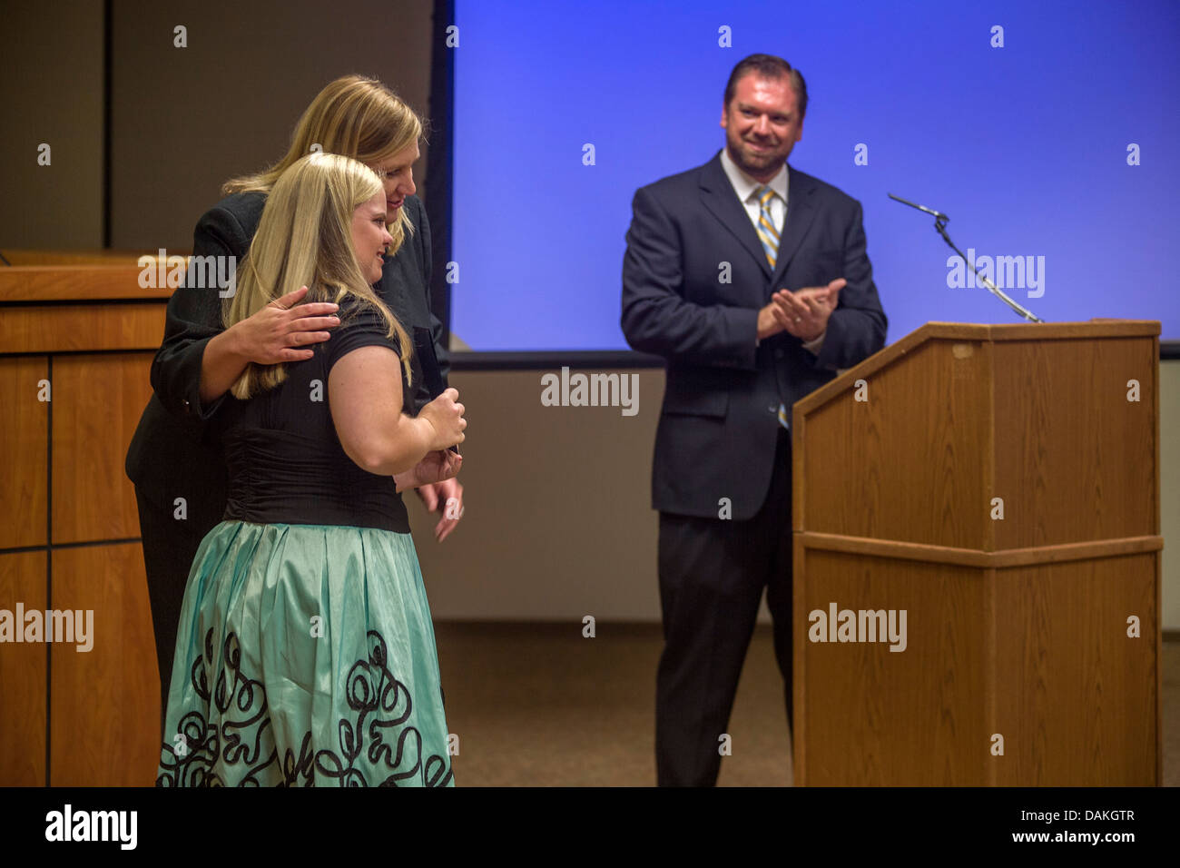 An Adult Transition Program (ATP) student receives her diploma at ...