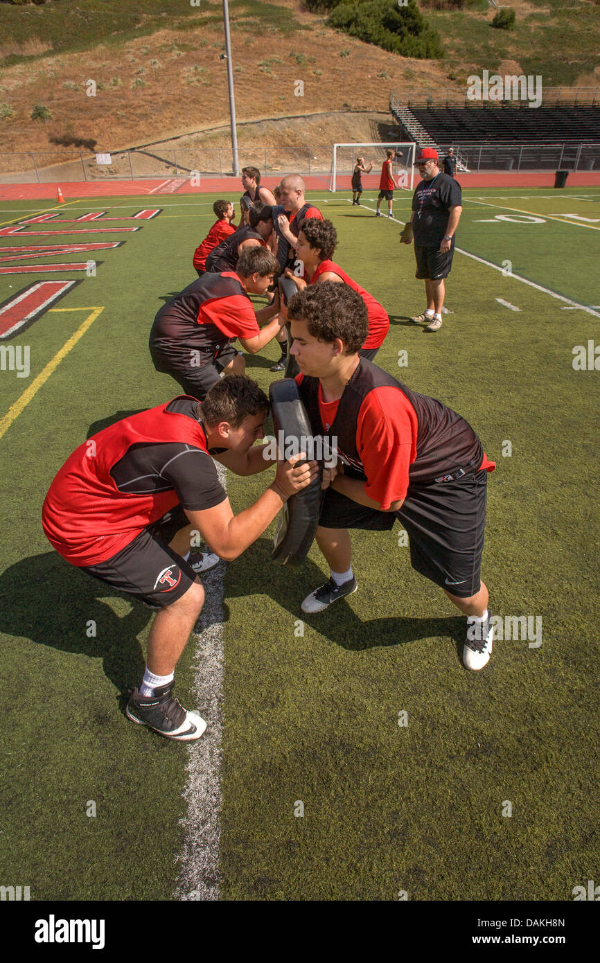 Football practice pushing hi-res stock photography and images - Alamy