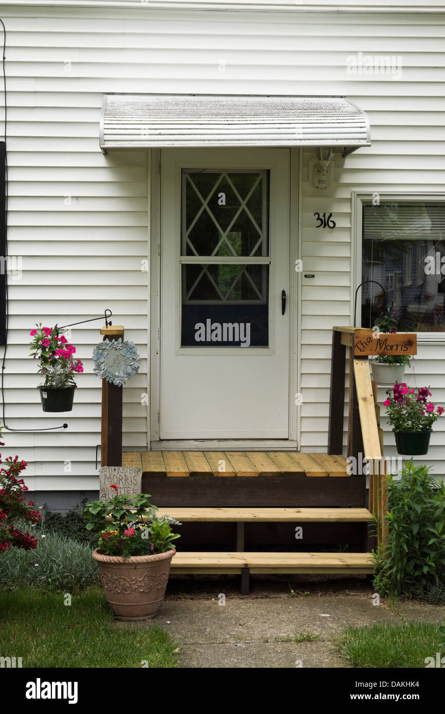 Front door of a private family home in a working class neighborhood ...