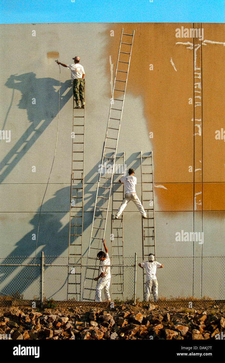 Working from ladders hi-res stock photography and images - Alamy