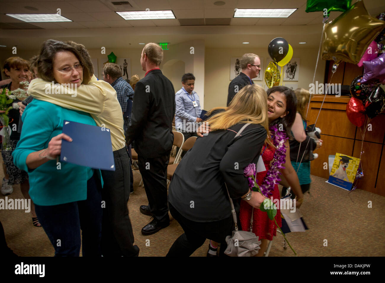 Family members cheer graduates of the Adult Transition Program (ATP ...