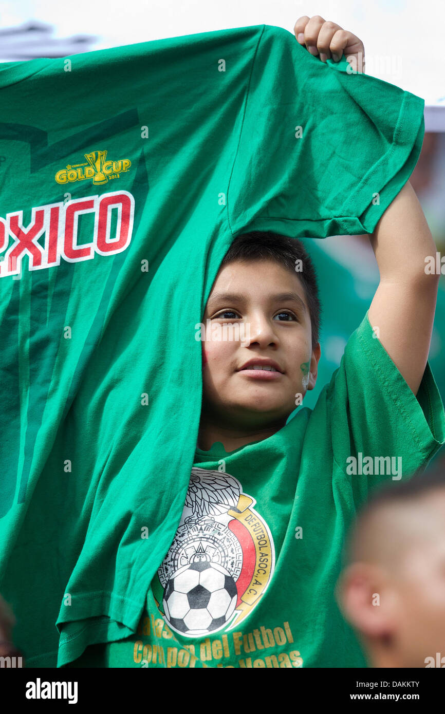 July 14, 2013 - Denver, Colorado, U.S - A young Mexican fan stands at ...