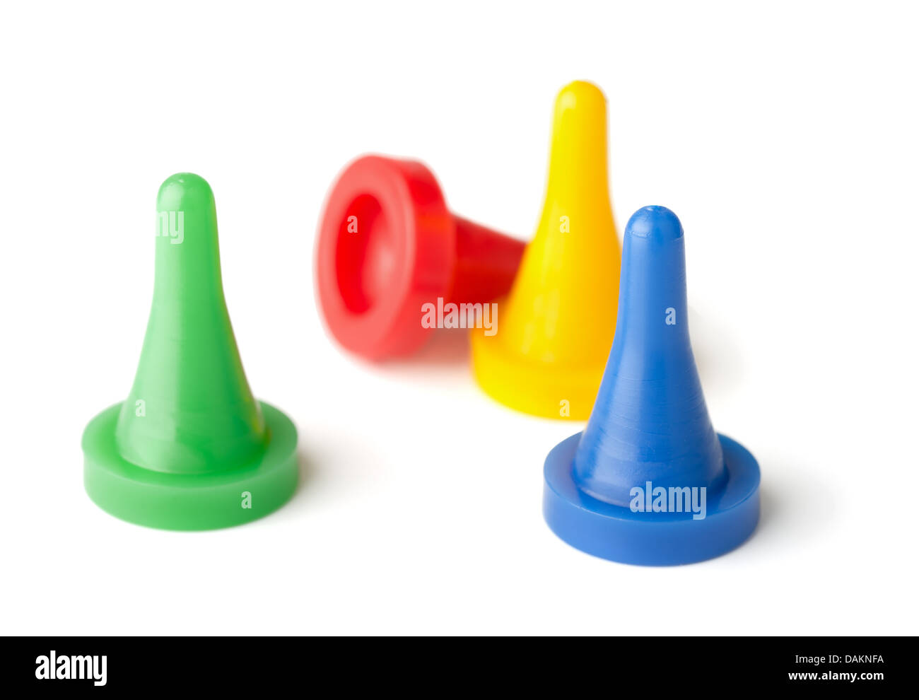 Color board-game pawns isolated on white Stock Photo - Alamy