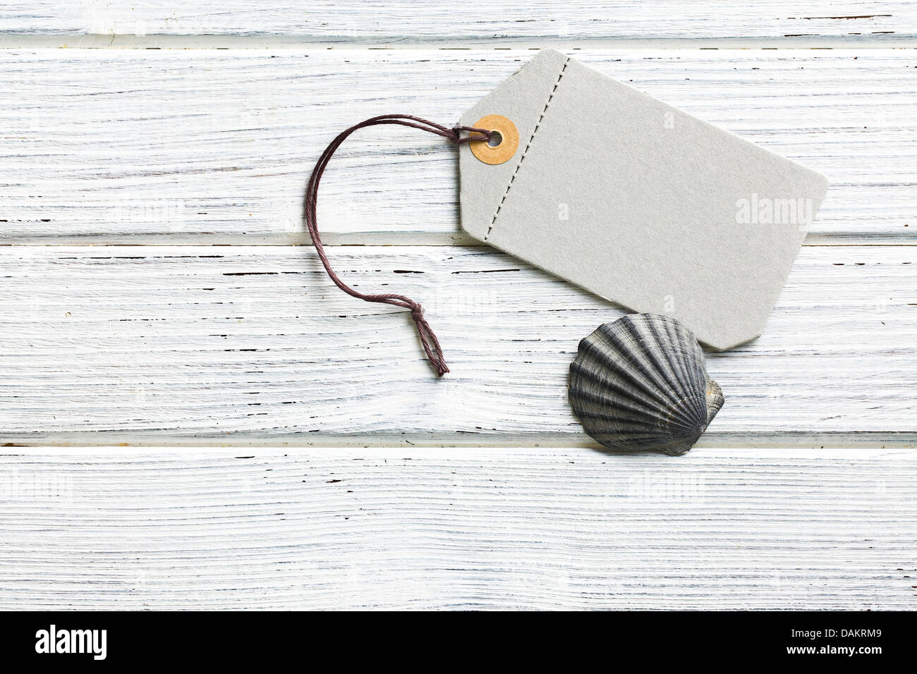 the price tag and sea shell Stock Photo - Alamy