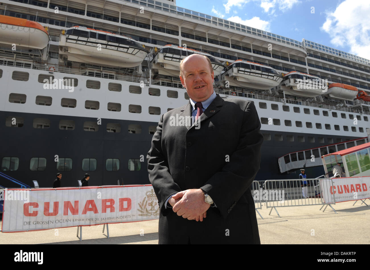 The president of the Cunard Line, Peter Shanks, is pictured in front of ...