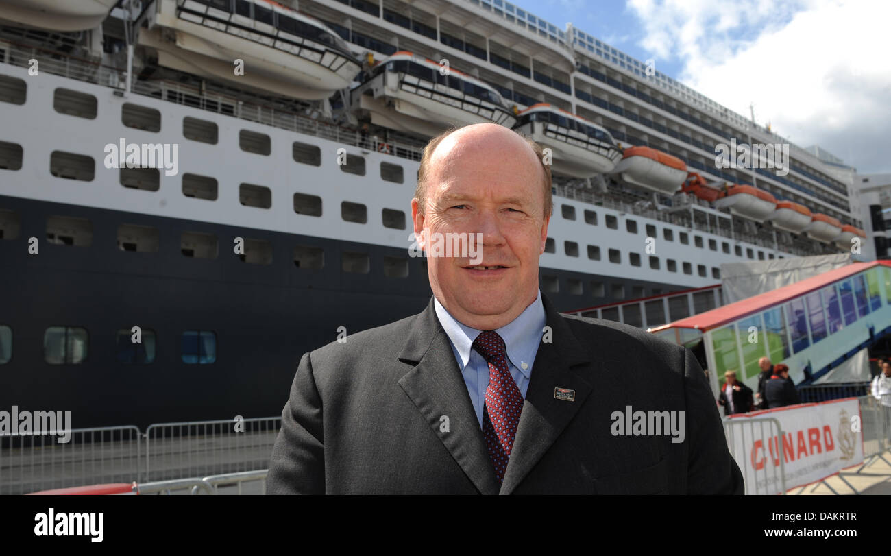 The president of the Cunard Line, Peter Shanks, is pictured in front of ...