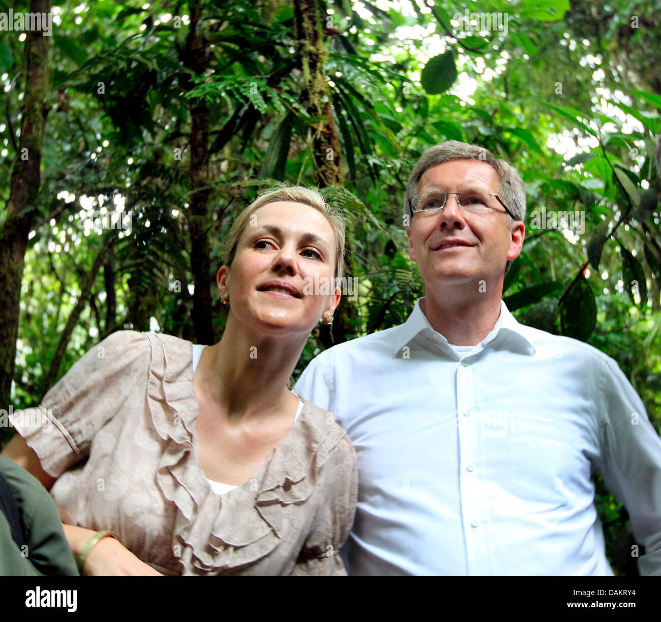 German Federal President Christian Wulff and his wife Bettina look at ...